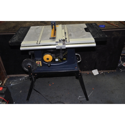 A PERFORMANCE PRO CLM1500TSS TABLE SAW with built in stand, two ...