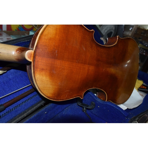 A CASED VIOLIN, two piece back, ebonized fingerboard, in a hard fitted ...