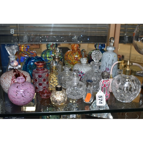 A GROUP OF SCENT BOTTLES, twenty one examples to include a pink and ...