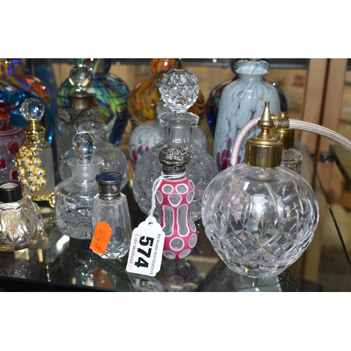 A GROUP OF SCENT BOTTLES, twenty one examples to include a pink and ...