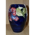 A MOORCROFT POTTERY 'HIBISCUS' PATTERN VASE, of ovoid form, tube lined ...
