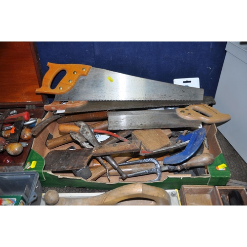 A COLLECTION OF CARPENTRY TOOLS including saws, chisels, an auger bit ...