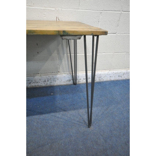 AN UPCYCLED RECTANGULAR PINE TABLE, constructed from a gate, raised on ...