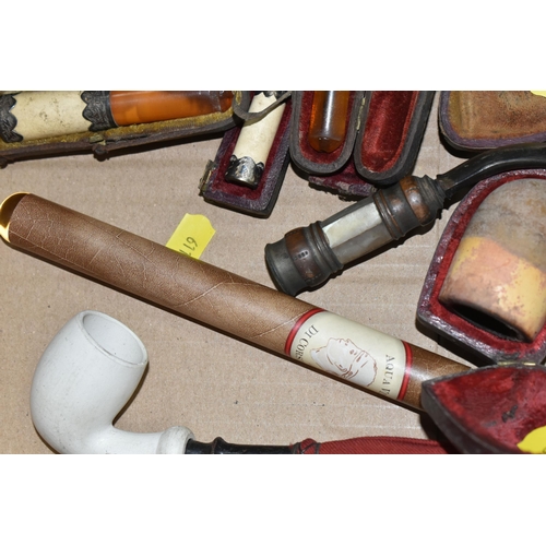A COLLECTION OF TOBBACCO PIPES AND CHEROOT HOLDERS, comprising eleven ...