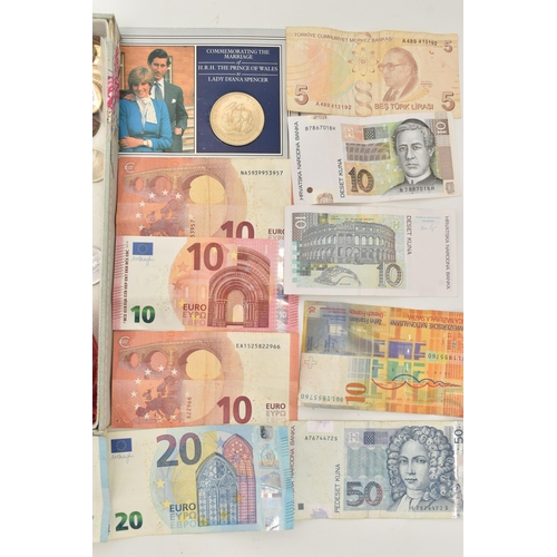 A CARDBOARD TRAY OF COINS AND BANKNOTES, to include over seventy Euro ...