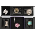 SIX BOXED WHITE METAL RINGS, various designs each set with stones to ...
