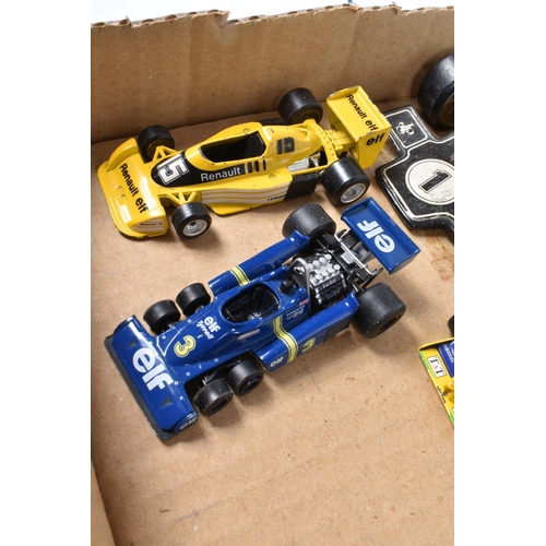 A QUANTITY OF UNBOXED AND ASSORTED F1 RACING CAR MODELS, to include ...