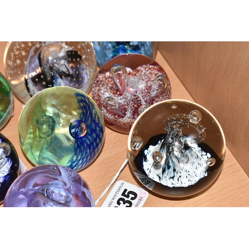 A COLLECTION OF ELEVEN CAITHNESS GLASS PAPERWEIGHTS, comprising three ...