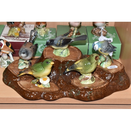 A COLLECTION OF EIGHTEEN BESWICK BIRDS to include two Goldcrest No ...