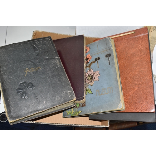 FOUR ALBUMS OF POSTCARDS containing approximately 642 early 20th ...