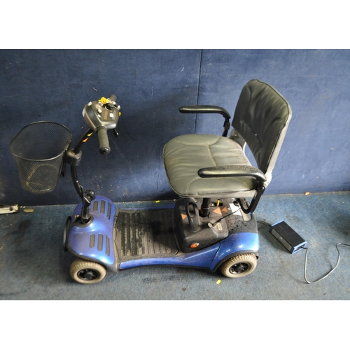 A SHOPRIDER MOBILITY SCOOTER, with two keys and charger (PAT pass and ...
