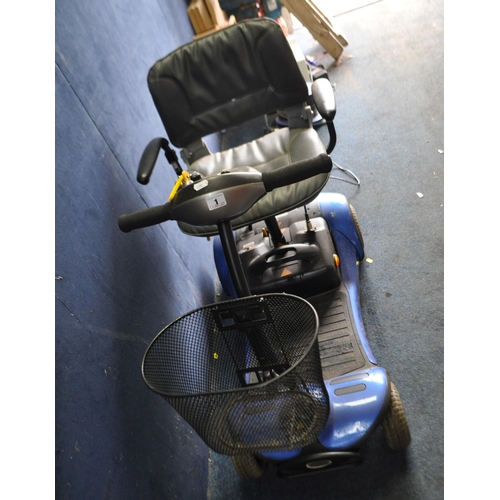 A SHOPRIDER MOBILITY SCOOTER, with two keys and charger (PAT pass and ...