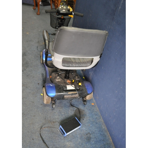 A SHOPRIDER MOBILITY SCOOTER, with two keys and charger (PAT pass and ...