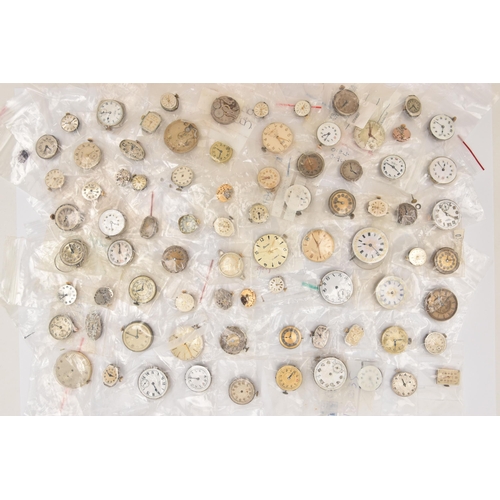 A LARGE SELECTION OF WATCH MOVEMENTS, a bag of movements names to ...