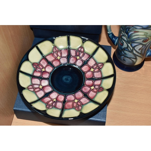 THREE MOORCROFT POTTERY ITEMS to include two boxed 'Violet' patterned ...