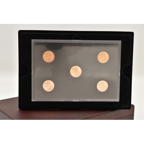 A CASED DISPLAY OF GOLD SOVEREIGNS COINS, to include four X full gold ...