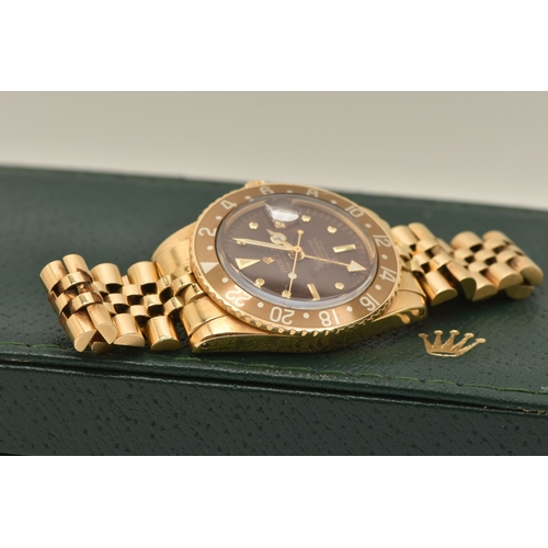 A 1974 YELLOW GOLD ROLEX OYSTER PERPETUAL GMT MASTER WRISTWATCH, model ...