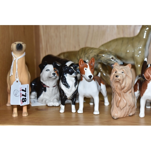 A GROUP OF BESWICK DOG FIGURES, comprising sixteen examples to include ...