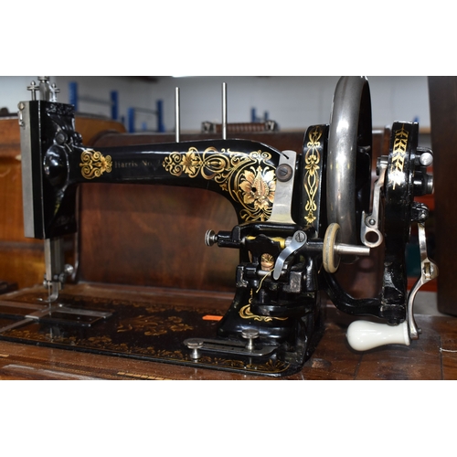A GROUP OF THREE SEWING MACHINES to include a cased Harris No. 2 sewing ...