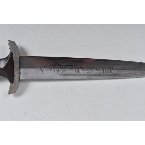 A GERMAN SA DAGGER WITH SCABBARD, this features the motto Alles für ...
