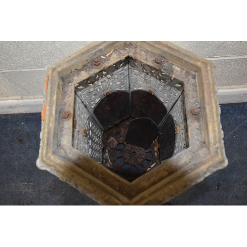 VERITAS STOVE, A 19TH CENTURY WHITE PAINTED CAST IRON HEXAGONAL STOVE ...