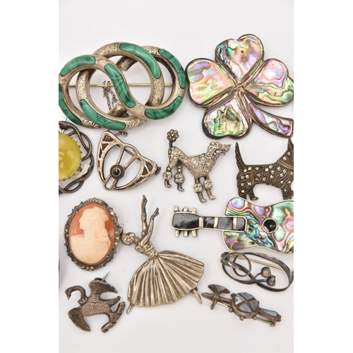 AN ASSORTMENT OF SILVER AND WHITE METAL BROOCHES, to include a silver ...