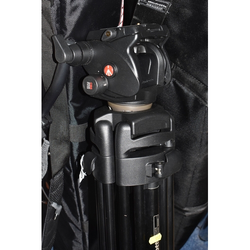 A GROUP OF TRIPODS to include two Manfrotto 525MVB tripods, and an E ...