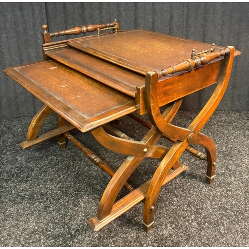 An antique mahogany colonial nest and tray table