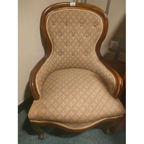 Quality reproduction spoon back chair with button backing