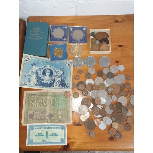 A Selection Of Coins And Notes To Include Crowns, British And ...