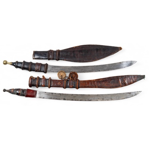 A group of seven swordsTo include:[a] North African, Two Tuareg swords ...