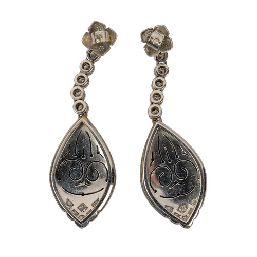 A pair of opal and diamond pendant earringsThe pear-shaped opals ...