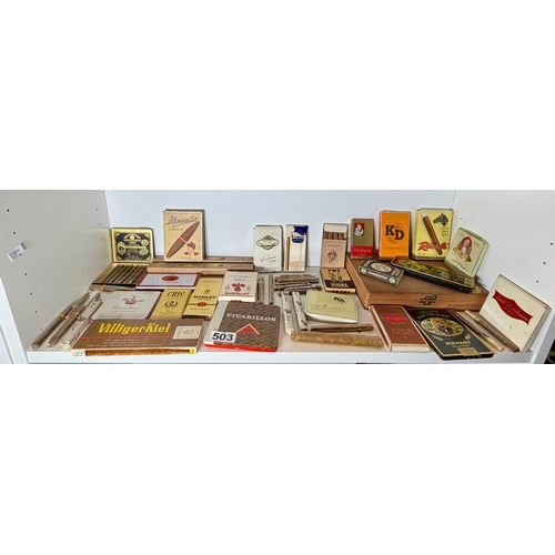 Large collection of cigar boxes with cigars and loose cigars