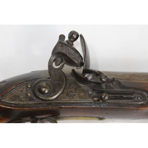 A FLINTLOCK NEW LAND PATTERN PISTOL CIRCA 1810 WITH 9IN BARREL STRUCK ...