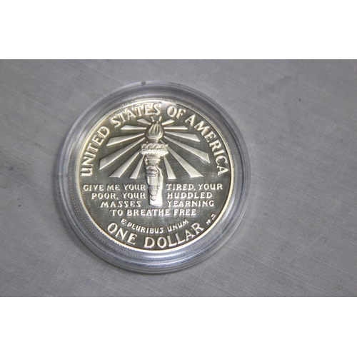 ELLIS ISLAND SILVER LIBERTY DOLLAR COIN