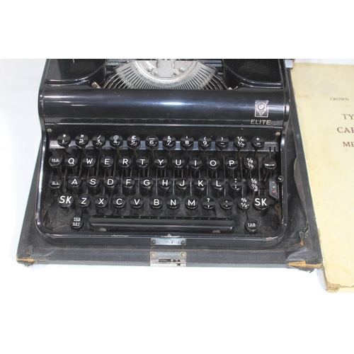 VINTAGE TYPEWRITER AND CARBON SHEETS