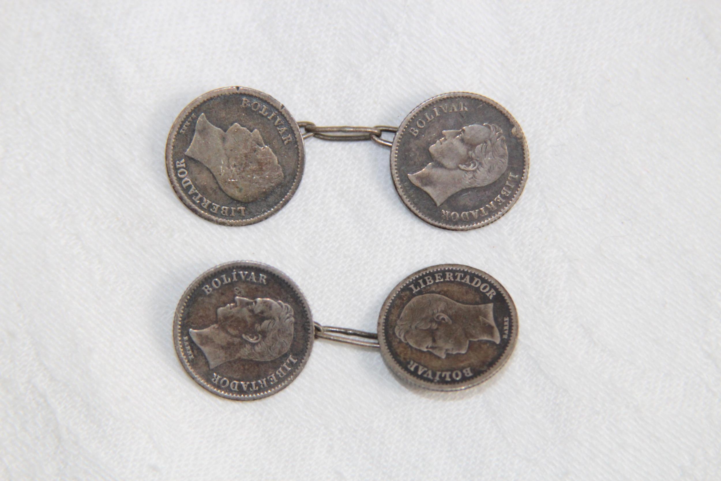 PAIR OF SILVER COIN FORMED CUFFLINKS