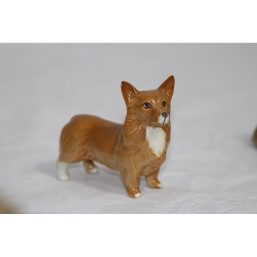 QUANTITY OF CORGI FIGURES INCLUDING BESWICK 12 X 11CM
