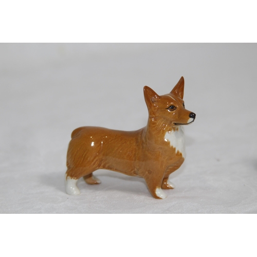QUANTITY OF CORGI FIGURES INCLUDING BESWICK 12 X 11CM