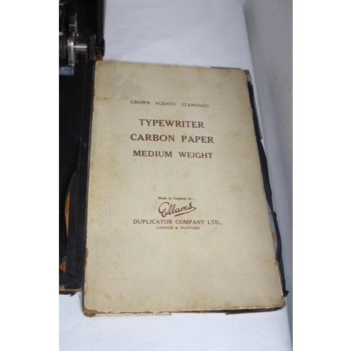 VINTAGE TYPEWRITER AND CARBON SHEETS