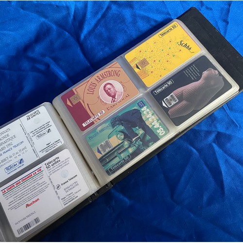 Folder Complete With Various Telephone Cards.