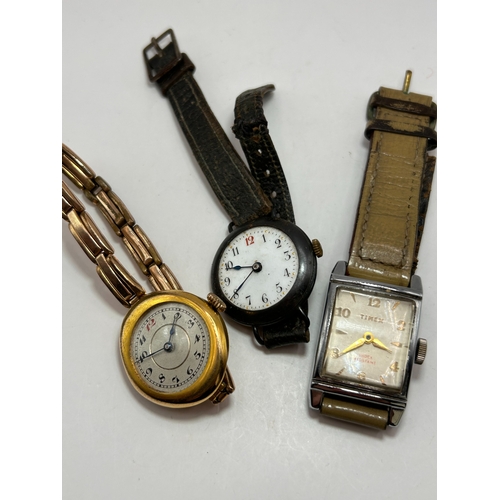Three Vintage Wristwatches, including a Trench Watch and a Timex Shock ...