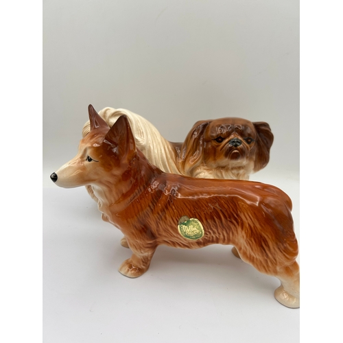 A Pair of Melba Ware Pembrokeshire Corgi and Pekingese Dog Figurines
