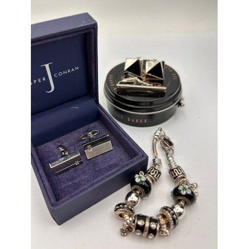 A Collection of Ted Baker and Jasper Conran Cufflinks with a Charm Bracelet