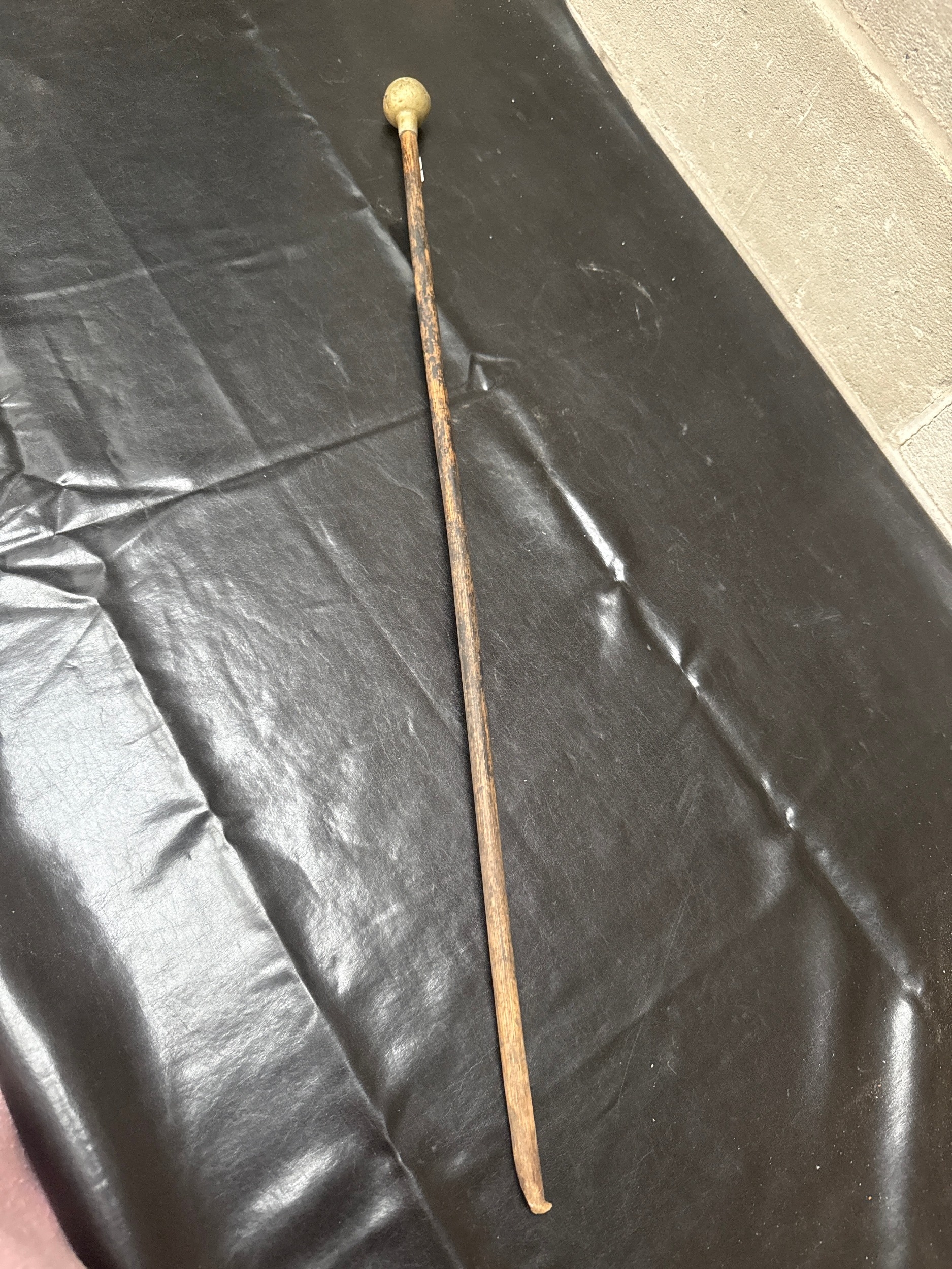 A Wooden and Brass Swagger Stick