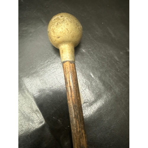 A Wooden and Brass Swagger Stick