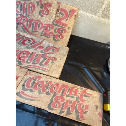 A Group of Five Vintage Hand-Painted Wooden Fairground Signs