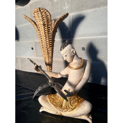 A Southeast Asian Style Figure of a Musician and a Woven Decorative Object