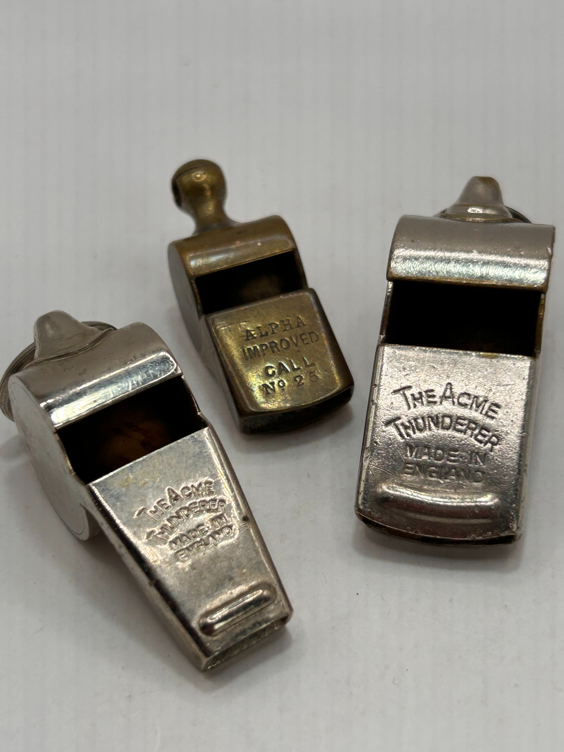 A Trio of Vintage Utility Whistles including Two Acme Thunderer and One ...