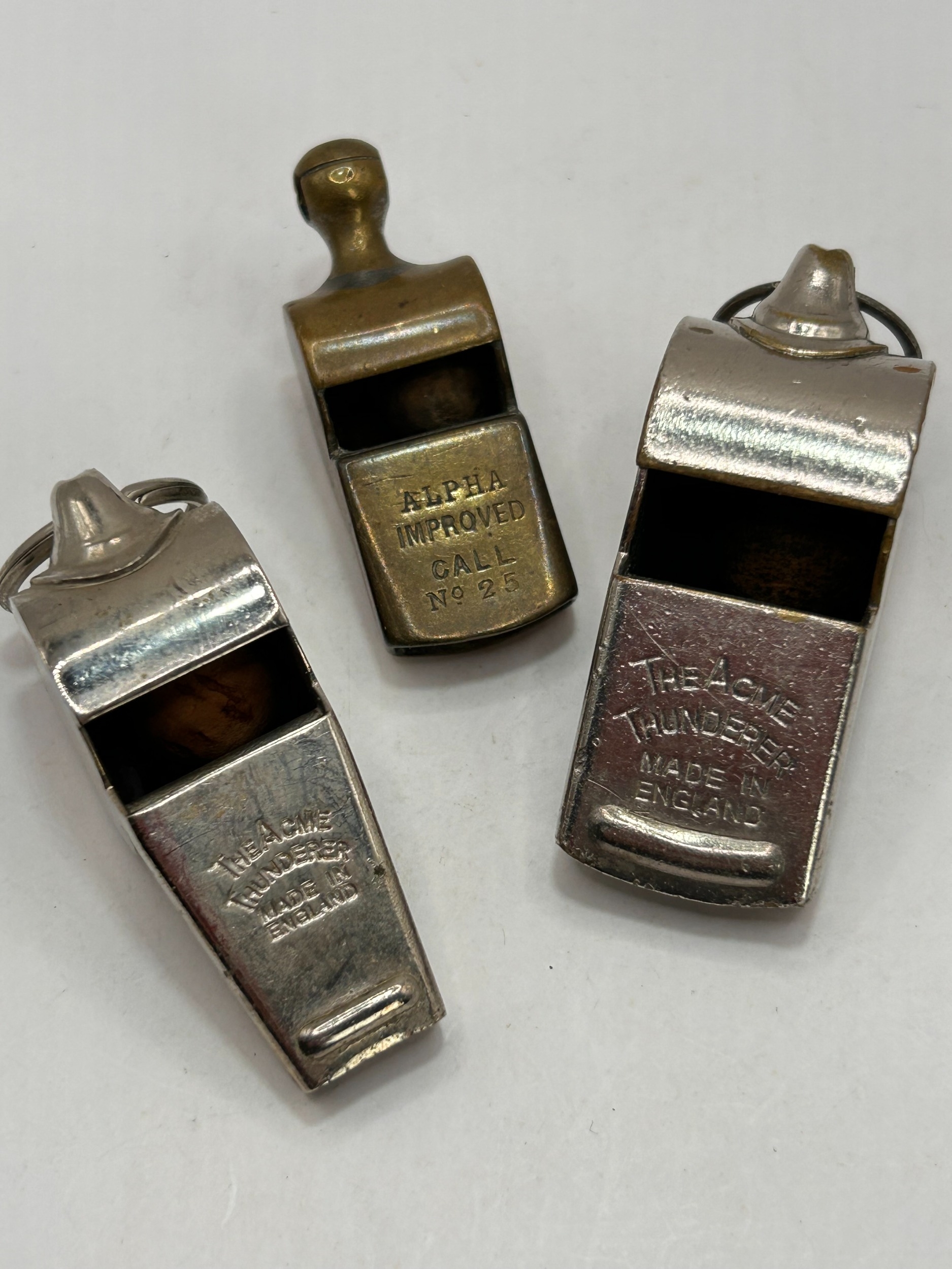A Trio of Vintage Utility Whistles including Two Acme Thunderer and One ...